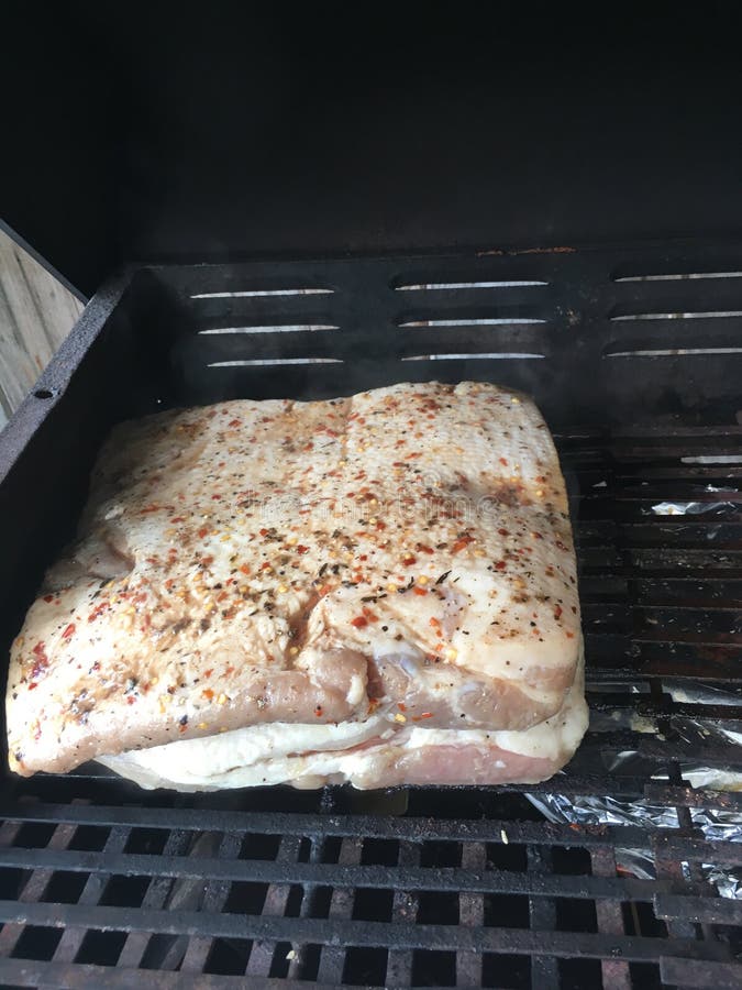 Smoking Bbq Bacon on the Bbq Stock Photo - Image of pork, chillies ...