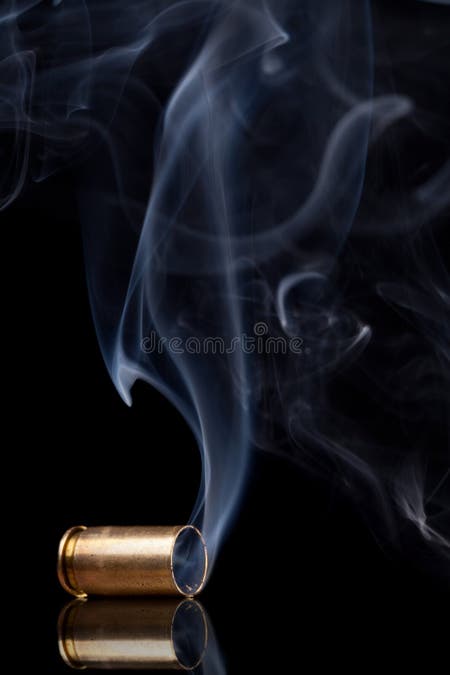 Smoking bullet casing stock image. Image of shell, ammunition - 23153029