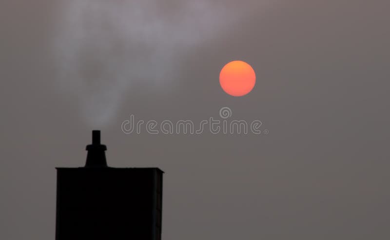 Smoking Chimney and Red Sun Stock Image - Image of ecology, rural ...
