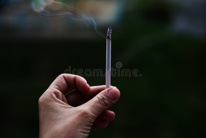 Smoking cigarette stock image. Image of hooked, cancerous - 91874301