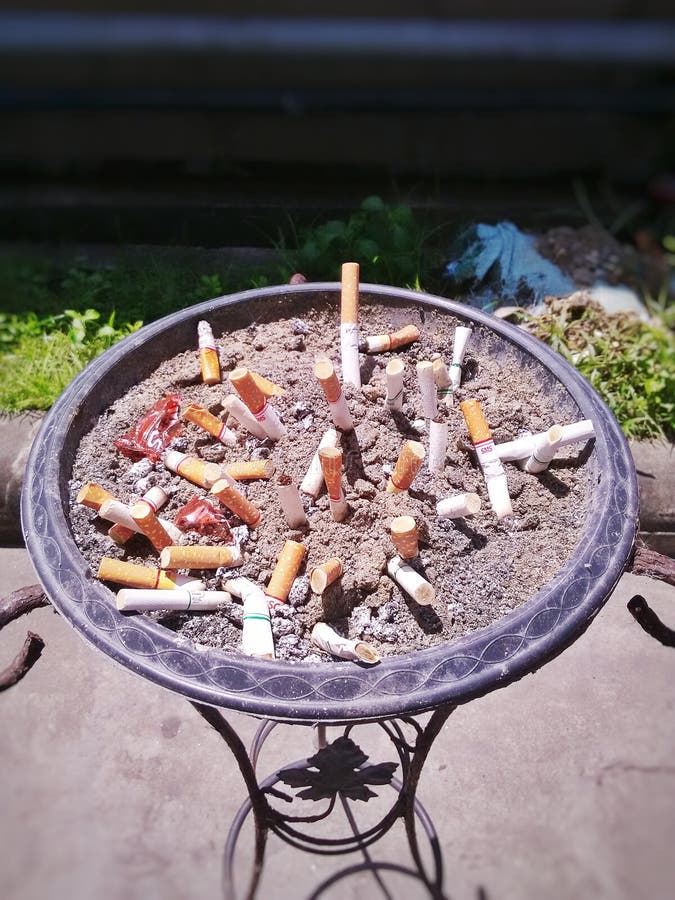 Smoking Cigarettes Corner editorial image. Image of stop - 117308430