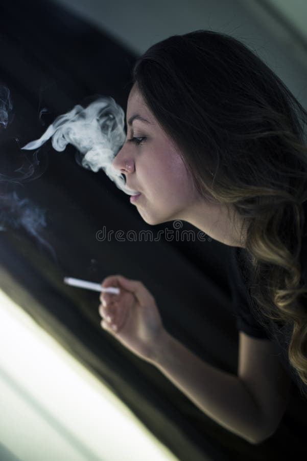 Smoking cute girl. stock photo. Image of ring, mist, looking - 53908054