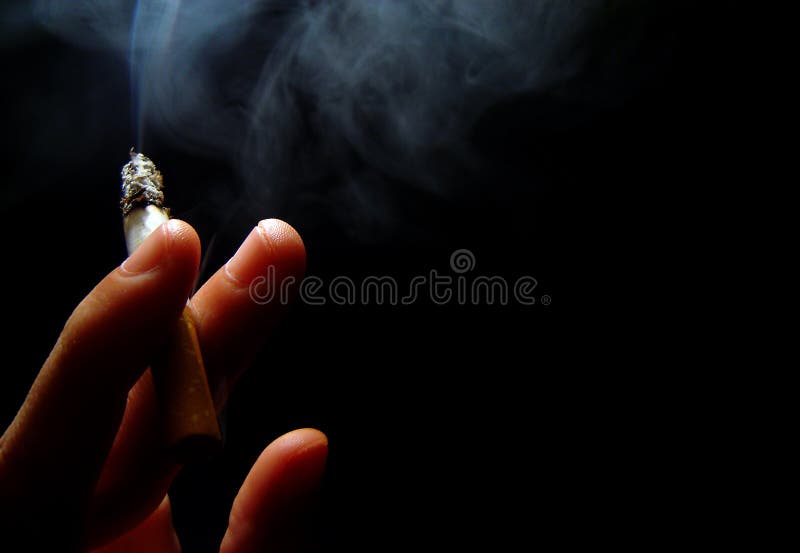 Smoking in the dark stock image. Image of addiction, risk - 1646843