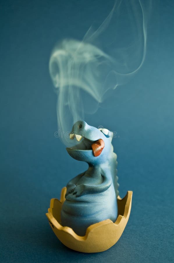 Smoking dragon stock image. Image of figure, cone, dragon - 7498101
