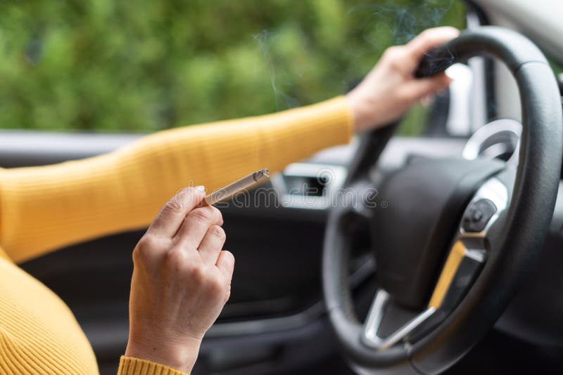 Smoking while driving stock photo. Image of travel, dangerous - 212024884