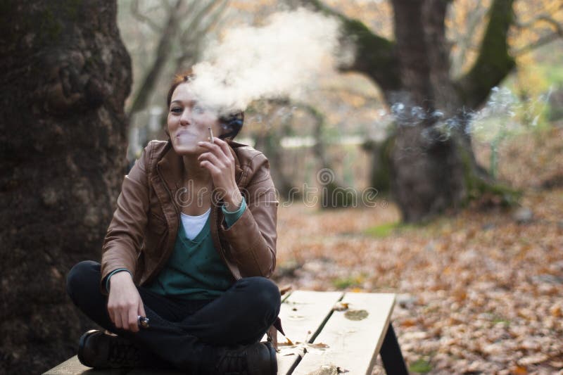 Smoking in the forest stock image. Image of caucasian - 42644791