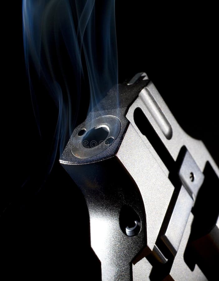 Revolver with smoke stock photo. Image of grip, millimeter - 19135986