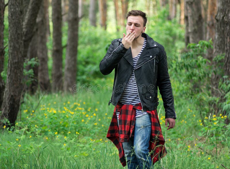 Smoking Guy with a Cigarette Stock Image - Image of rough, lonely: 71448193