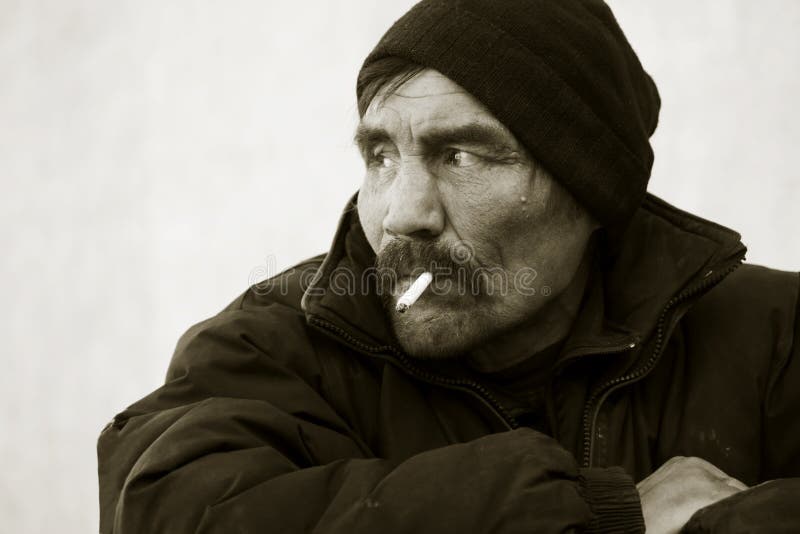Homeless Man Smoking a Cigarette Stock Photo - Image of begging ...