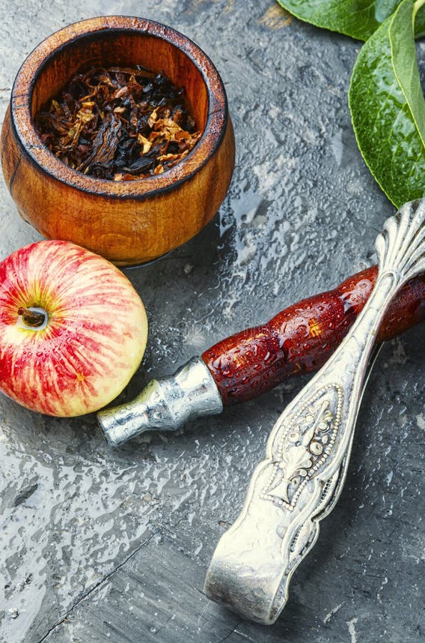 Smoking hookah with apple stock image. Image of addiction - 154380899