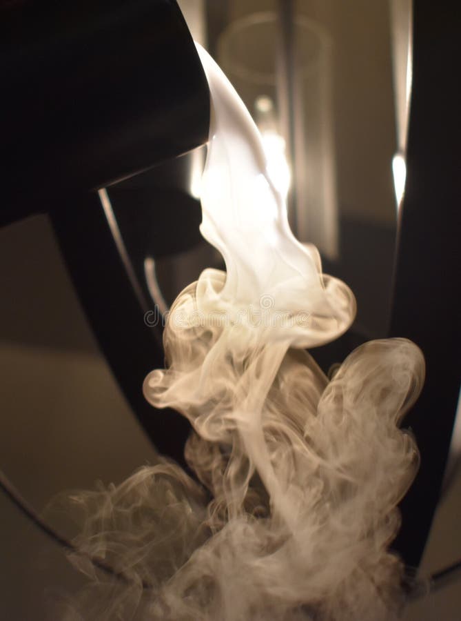 Smoking Ice stock image. Image of pouring, smoke, light - 93839267