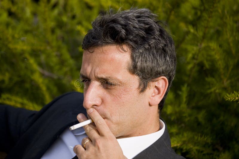 Smoking man stock photo. Image of looking, expression - 12508524
