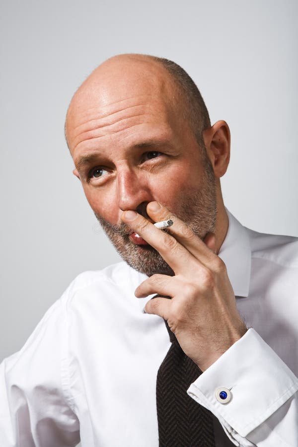 The smoking man stock image. Image of shot, caucasian - 6581645