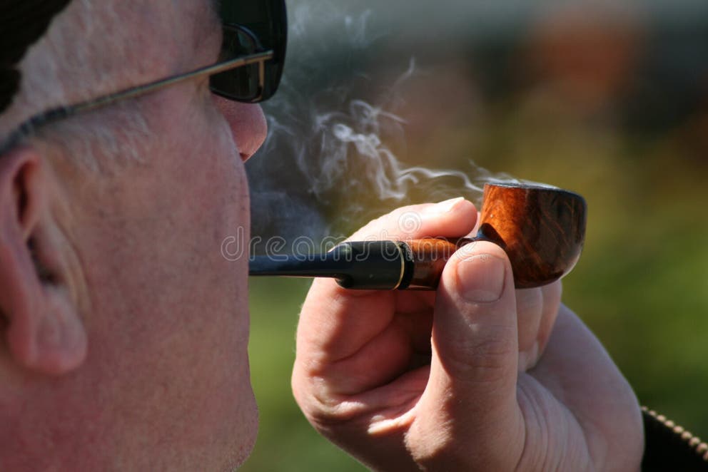 Smoking a pipe stock image. Image of smoking, male, inhale - 2530599