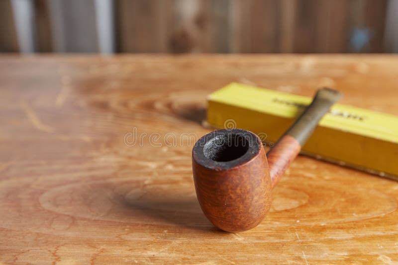 Smoking Pipe on and Old Table Stock Image - Image of black, relax: 59040257