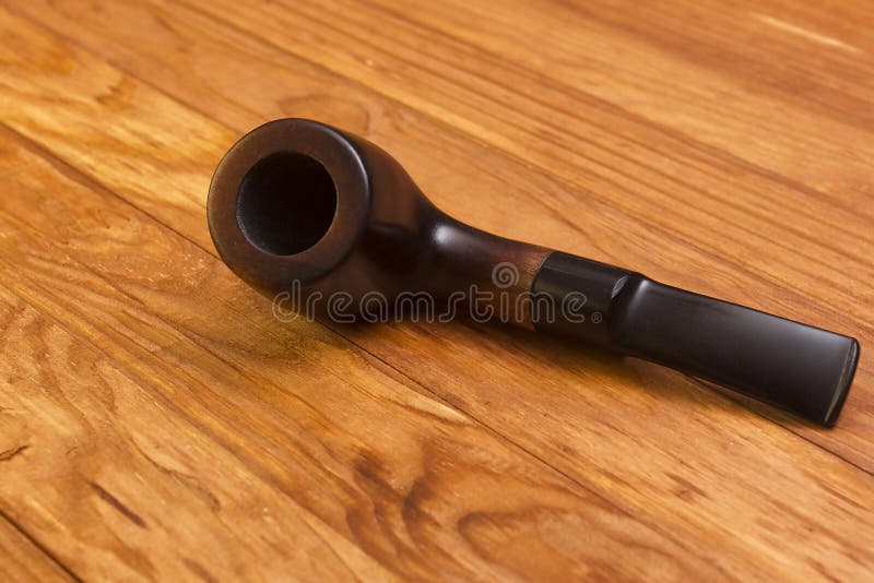 Smoking pipe on table stock photo. Image of smoking, pipe - 66119682