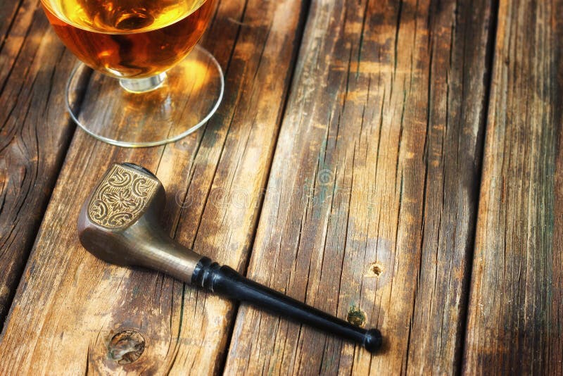 Smoking Pipe and Whiskey Glass on Wooden Table Stock Photo - Image of ...