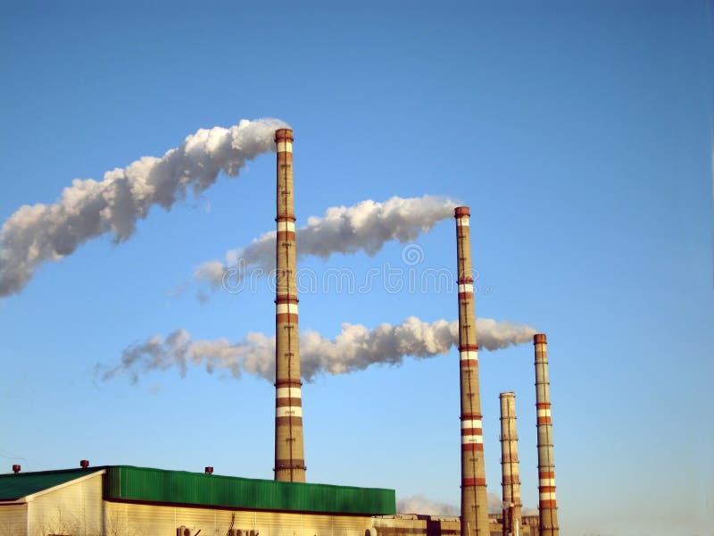 Smoking pipes of factory stock image. Image of energy - 23150267