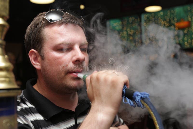 Smoking shisha man stock image. Image of dark, face, cancer - 10179745