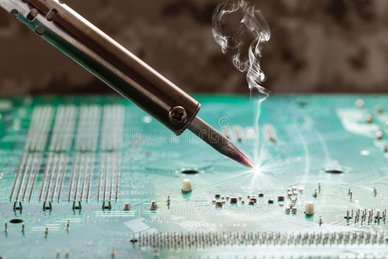 Smoking soldering iron stock image. Image of soldering - 70703673
