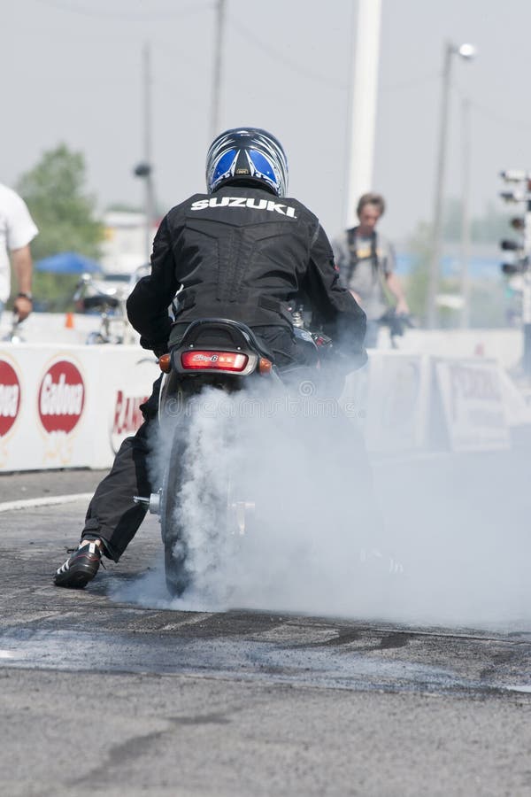 Smoking tire 2 editorial stock photo. Image of extreme - 25053093