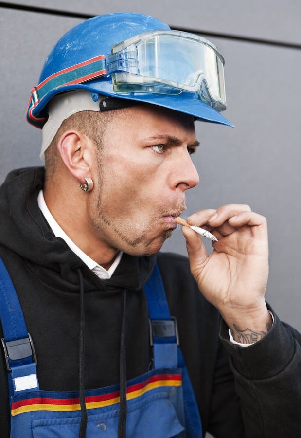 Smoking worker stock photo. Image of serious, site, worker - 11277286