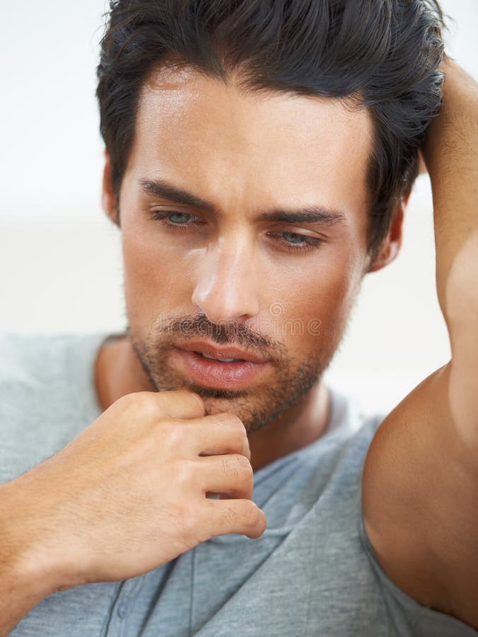 Smoldering Good Looks. a Handsome Young Man Looking Thoughtful. Stock ... Smoldering Good Looks. a Handsome Young Man Looking Thoughtful. Stock ...