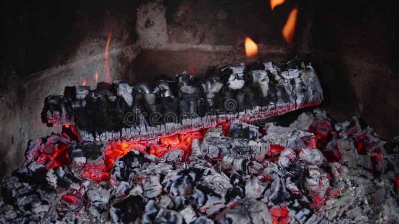 Smoldering Heat and Burning Log in a Fireplace Stock Video - Video of ...