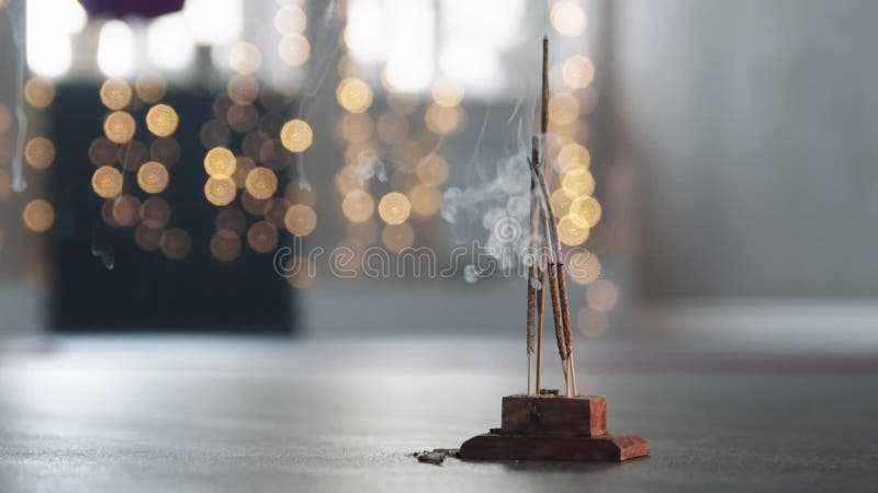 Smoldering Incense and a Person Conducting a Ritual before Meditation ...