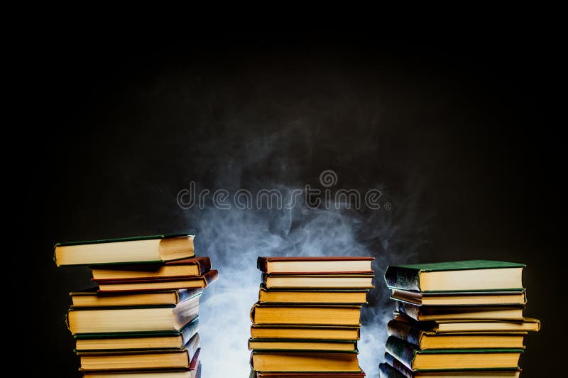 Smoldering Stack of Books stock photo. Image of heap - 30366564