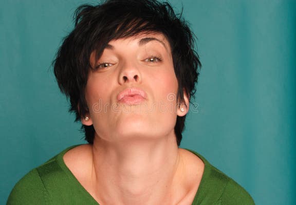 Smooch stock image. Image of face, female, expression - 20058829