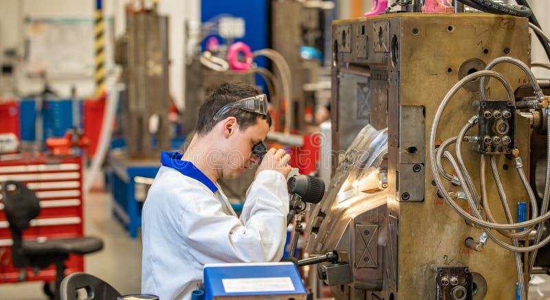 Smooth Accurate Work in the Factory Under Microscope Stock Image ...