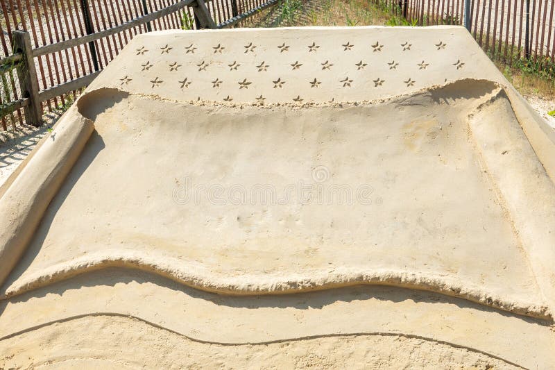 Smooth Bland Sand Sculpture Sign on the Beach Stock Image - Image of ...