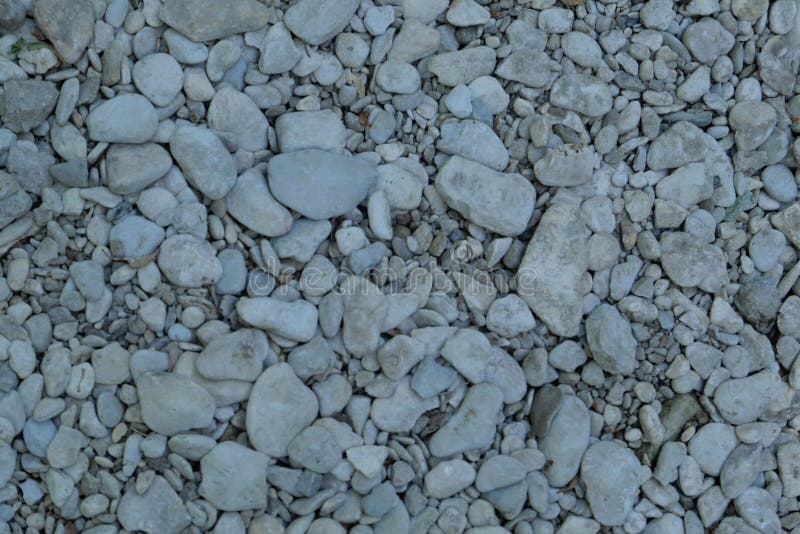 Smooth Blue Gray River Rocks Stock Photo - Image of wall, cobblestone ...