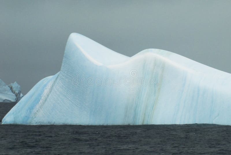 Smooth blue iceberg stock image. Image of cool, ocean - 14169311