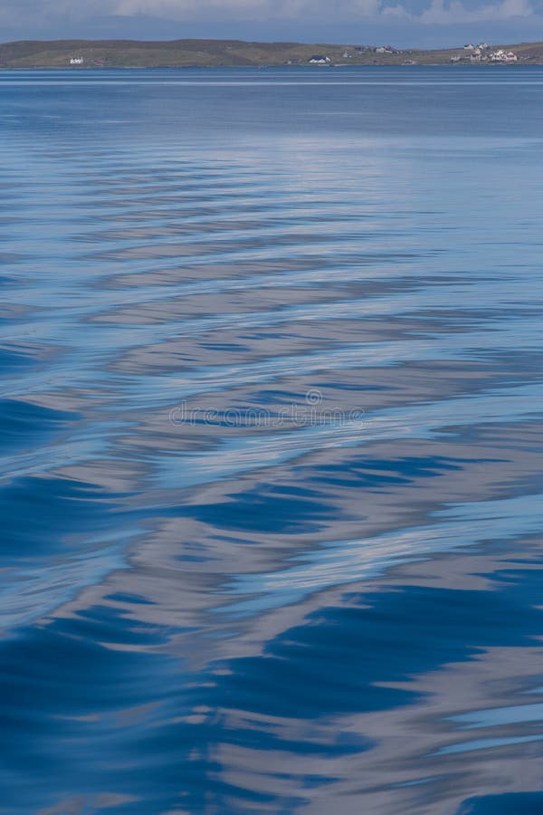 The smooth blue wake waves stock photo. Image of wake - 27620472