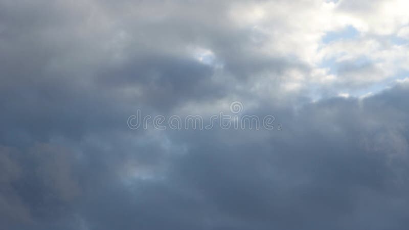 The Movement of Gloomy Dark Clouds Across the Sky at Sunset Stock ...