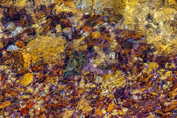 Smooth Clear Water Float on Colored Stone Stock Image - Image of round ...