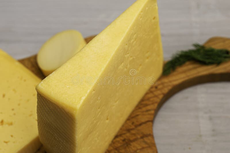 Smooth Cut of Natural Cheese for Background Stock Image - Image of ...