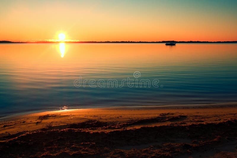 Smooth Lake Level at Warm Colorful Sunset, Sandy Beach Stock Image ...