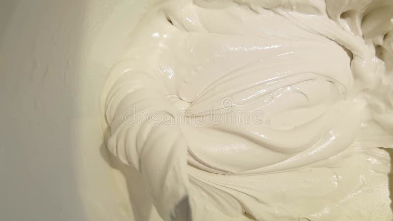 Smooth Mixing Process of Creamy Batter in Large Bowl Captured in High ...