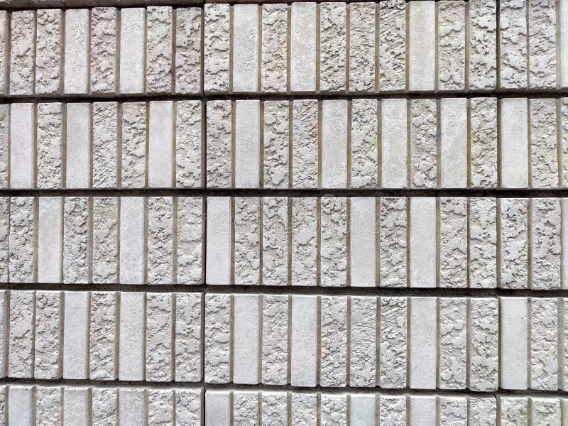 Neutral Textured Wall with Vertical Brick Pattern Provides Perfect ...