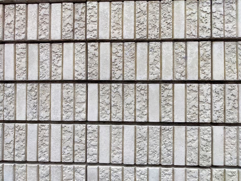 Neutral Textured Wall with Vertical Brick Pattern Provides Perfect ...