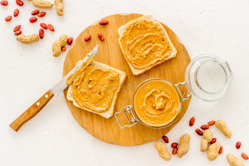 Smooth Peanut Butter on Sandwiches with Nuts. Top View Stock Image ...