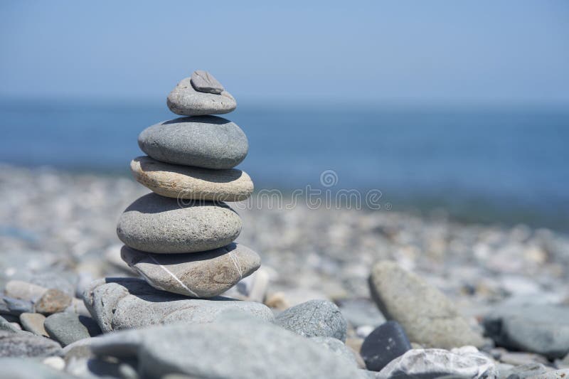 Smooth Pebbles on the Beach Against the Background of the Sea and ...