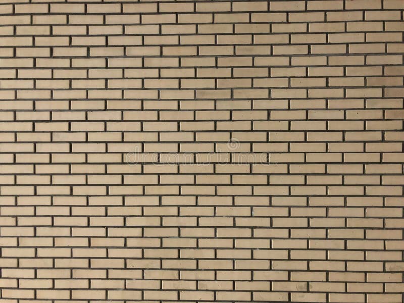 Smooth plain brick wall stock photo. Image of flooring - 340362332