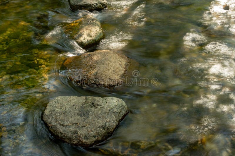 Smooth Rocks Form Stepping Stones in River Stock Photo - Image of ...