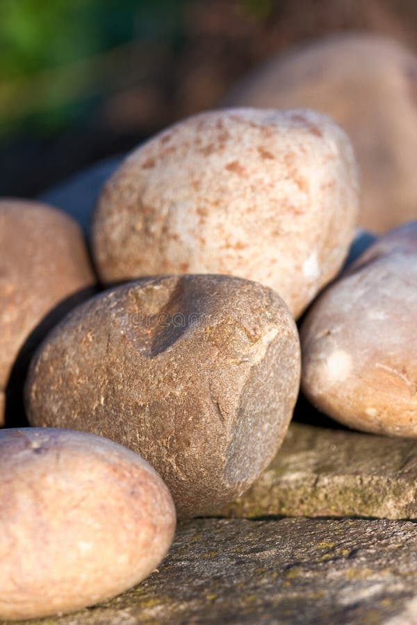 Smooth Rocks on a Wall in Warm Morning Light Stock Image - Image of ...