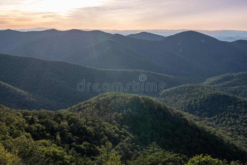 Smooth Rolling Mountains before Sunset Stock Image - Image of sunset ...