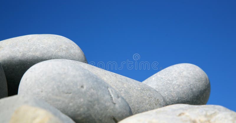 Smooth round grey pebbles stock photo. Image of round - 16397220